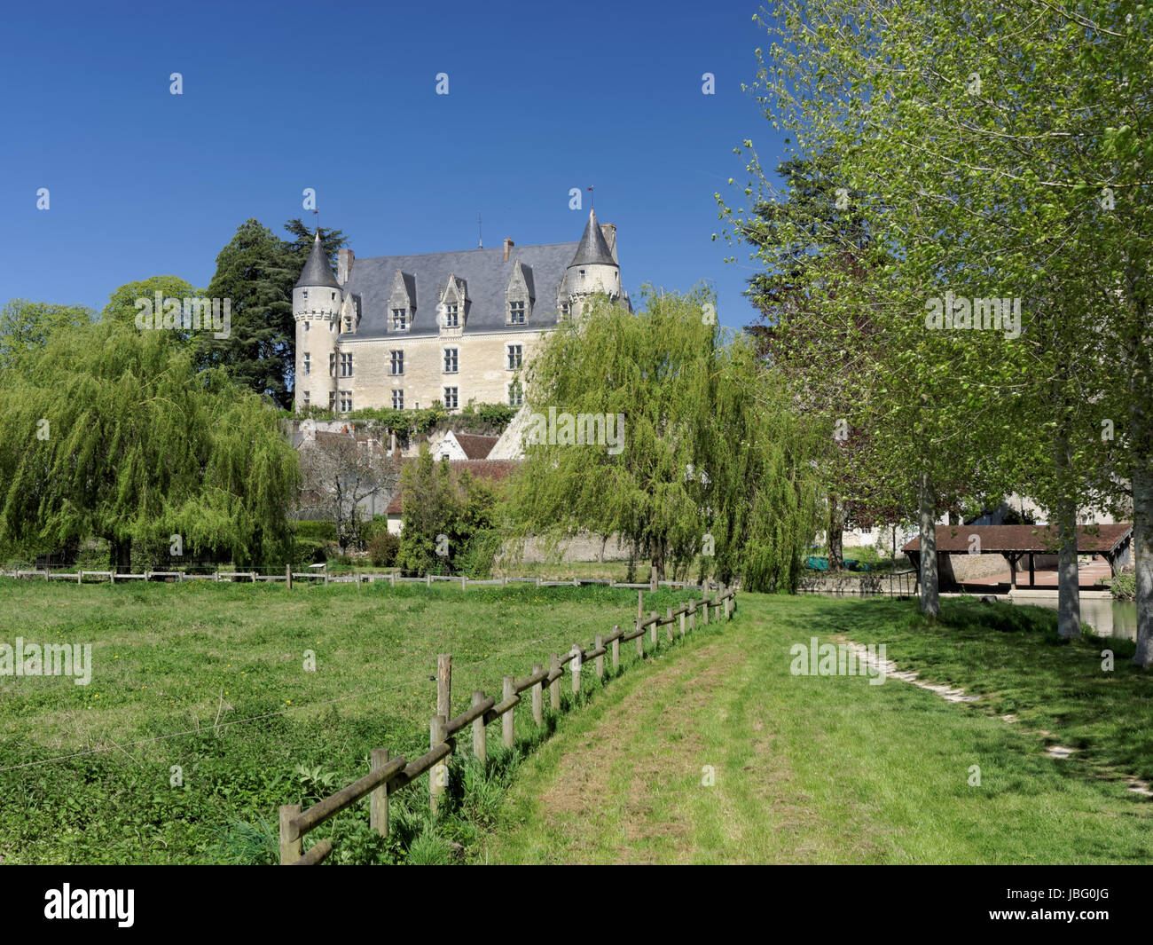 Montresor castle and village seen from a grass path, Indrois valley ...