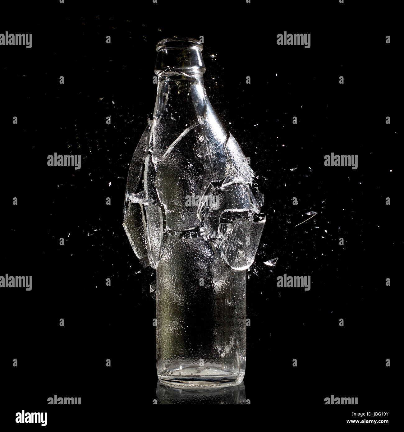 high speed photo of bottle explosion Stock Photo - Alamy