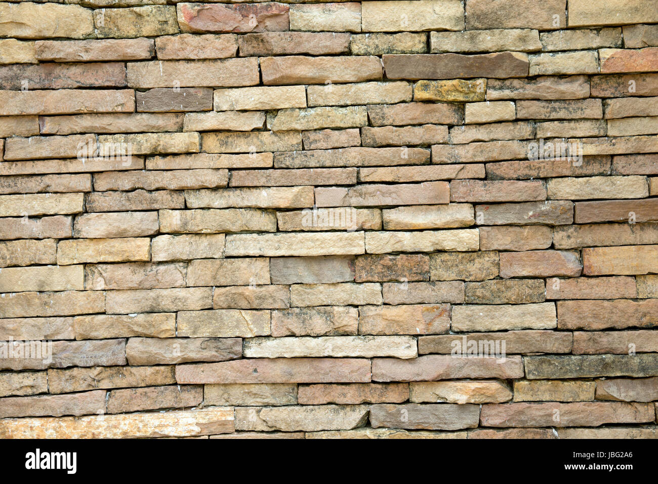 Modern stone brick wall background Stock Photo - Alamy