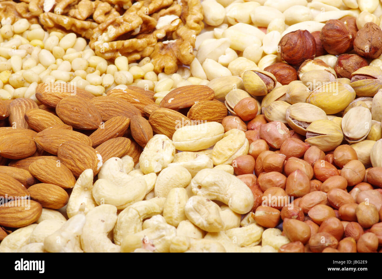 nuts collection isolated on background Stock Photo - Alamy