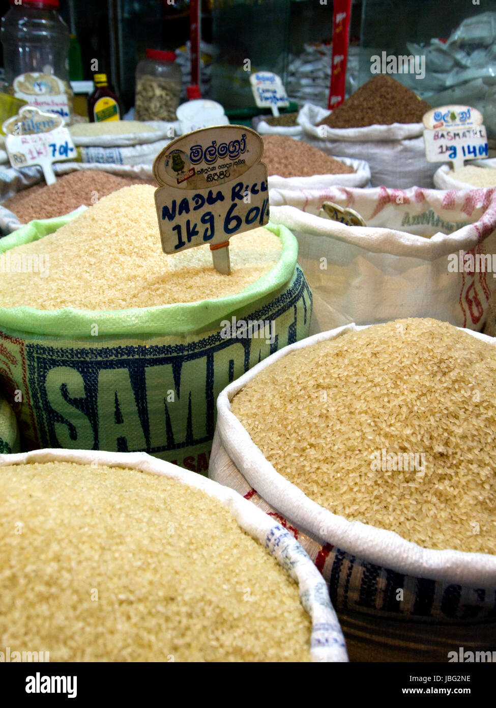 Different rice varieties at the market hall in Asia Stock Photo - Alamy