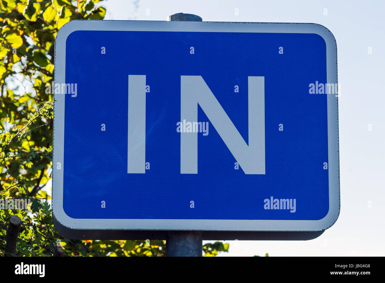 Blue sign indicating an entrance to traffic Stock Photo - Alamy