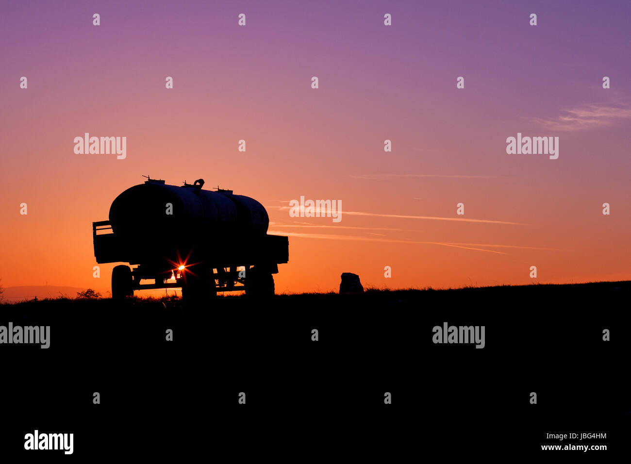 barrel in the sunset Stock Photo - Alamy