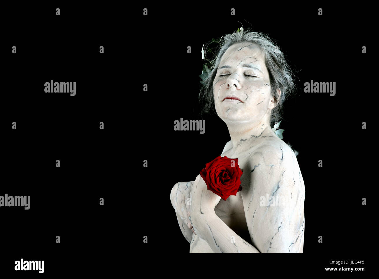 Woman painted red bodypainting paint hi-res stock photography and ...