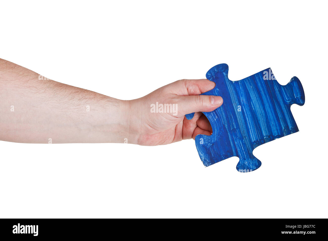 male hand with painted blue puzzle piece isolated on white background ...