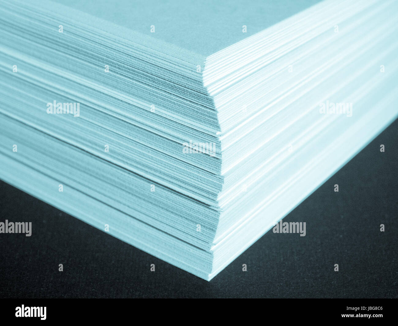 Blank sheets of A4 paper for office use - cool cyanotype Stock Photo ...