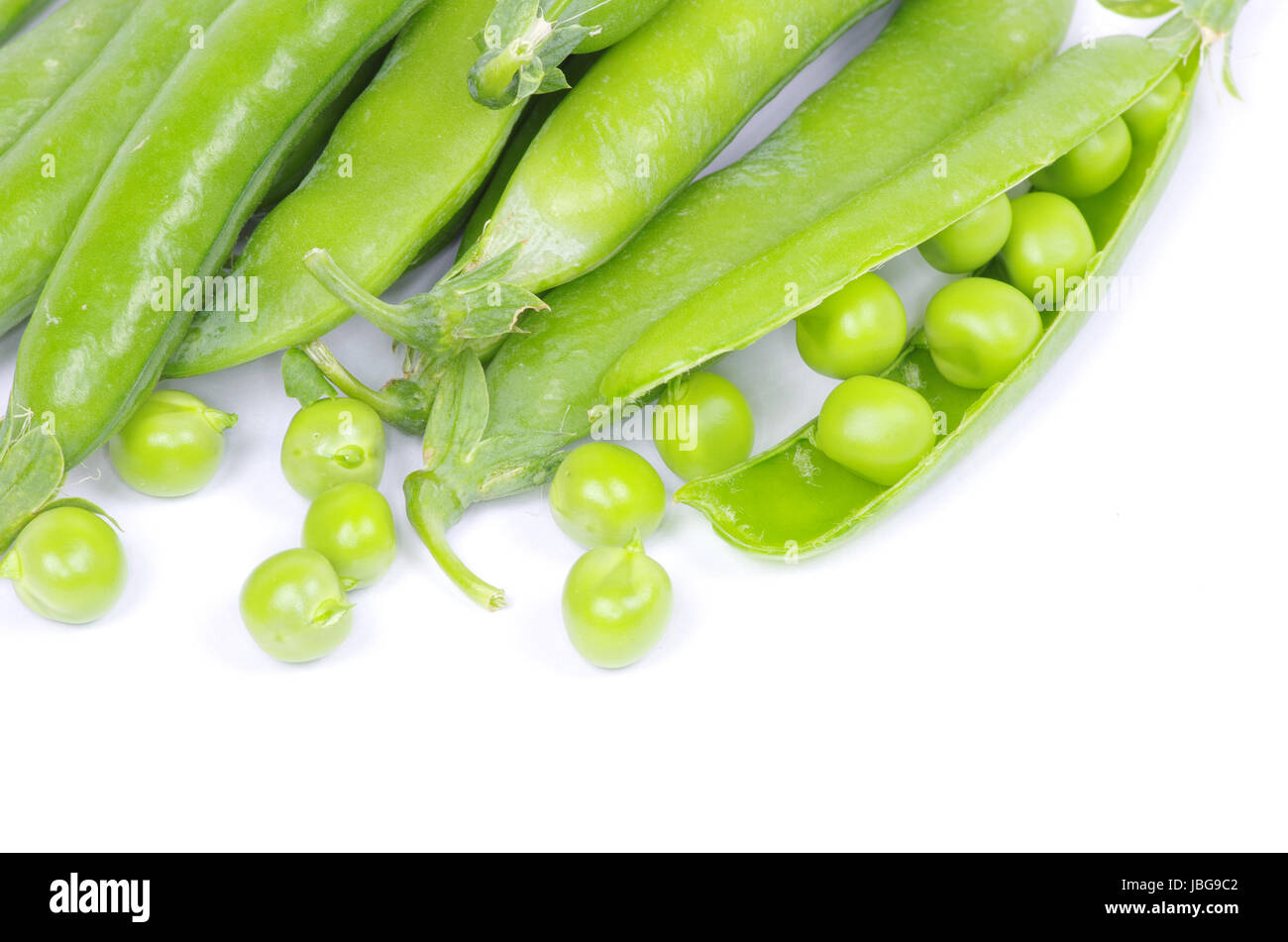 green peas vegetable closeup isolated on white Stock Photo - Alamy