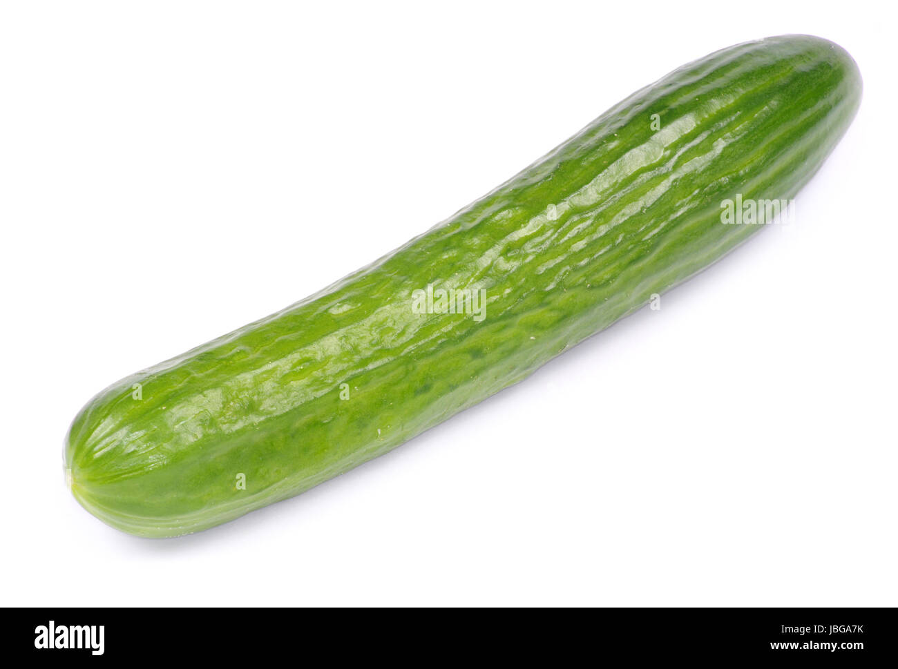 Ripe cucumber isolated on a white background Stock Photo - Alamy