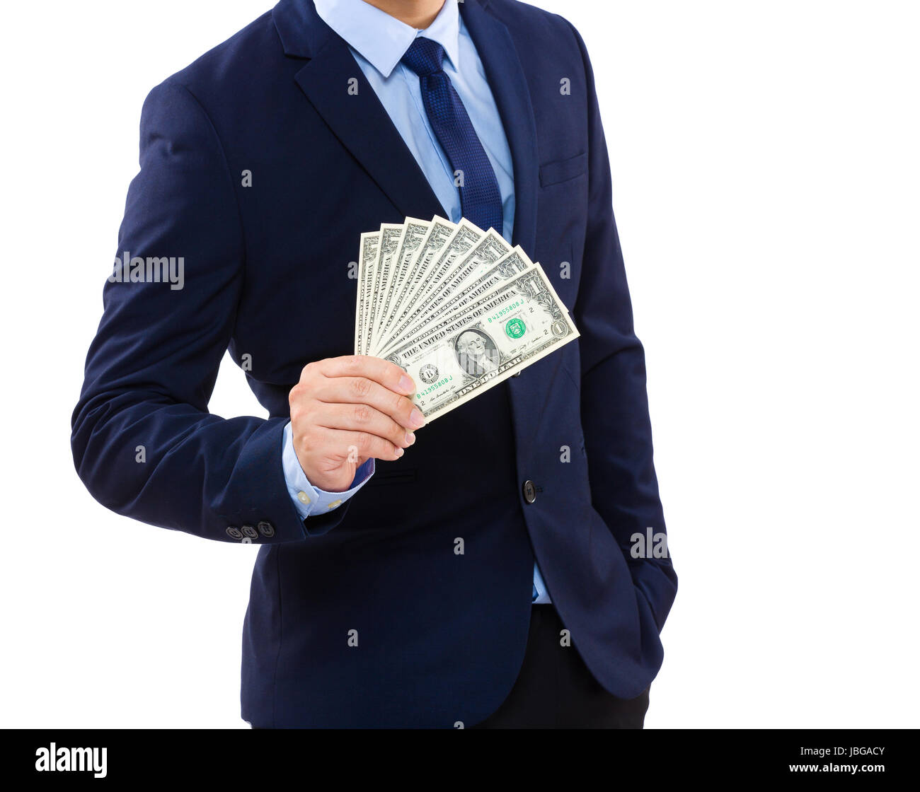 Businessman holding money Stock Photo - Alamy