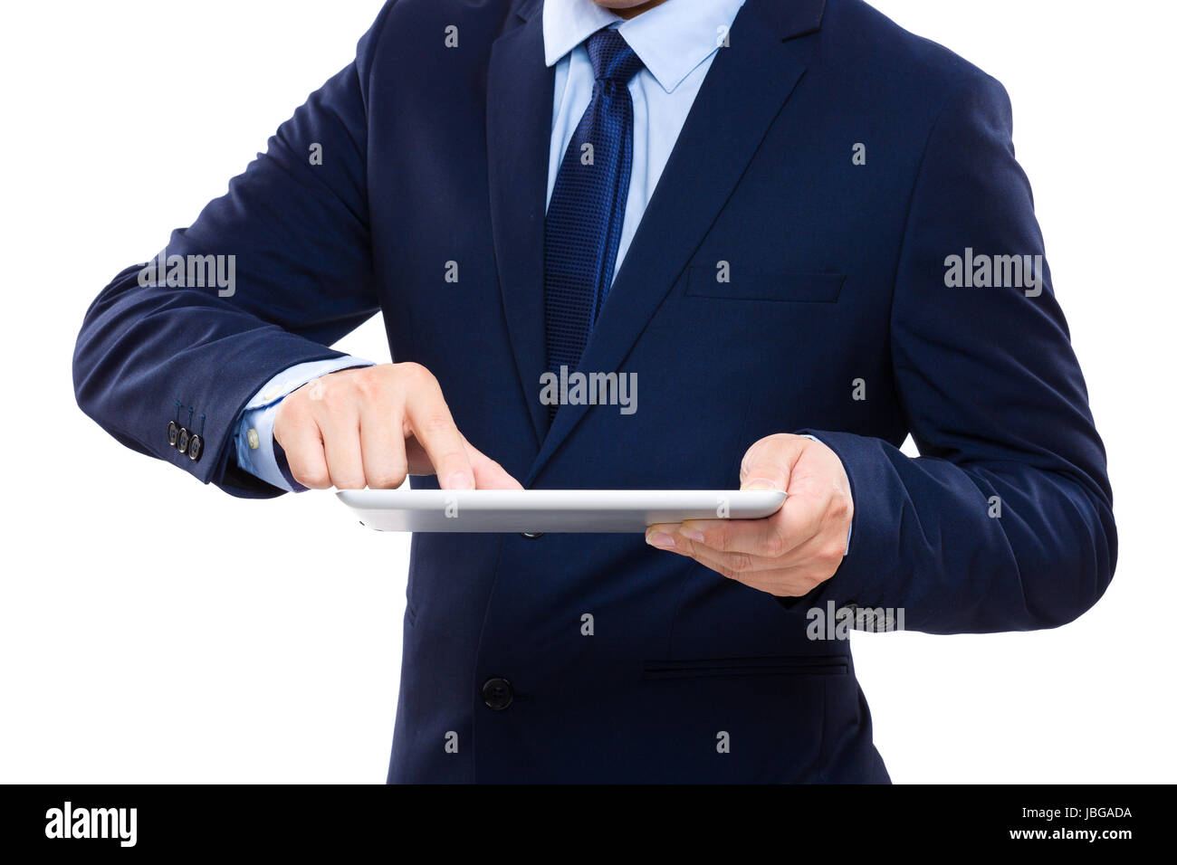 Businessman using tablet Stock Photo - Alamy