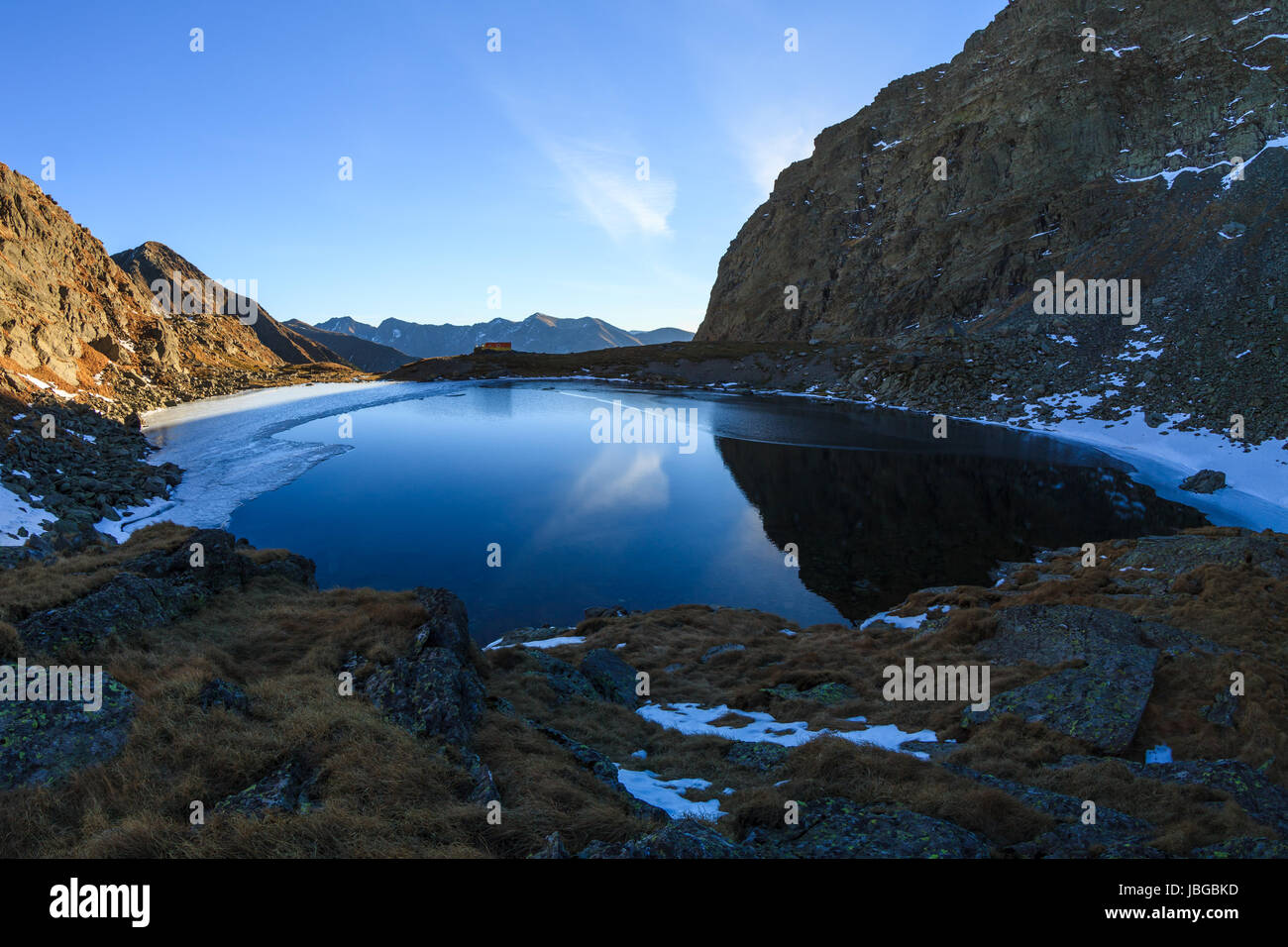 sunrise in Caltun lake. Fagaras Mountains, Romania Stock Photo - Alamy