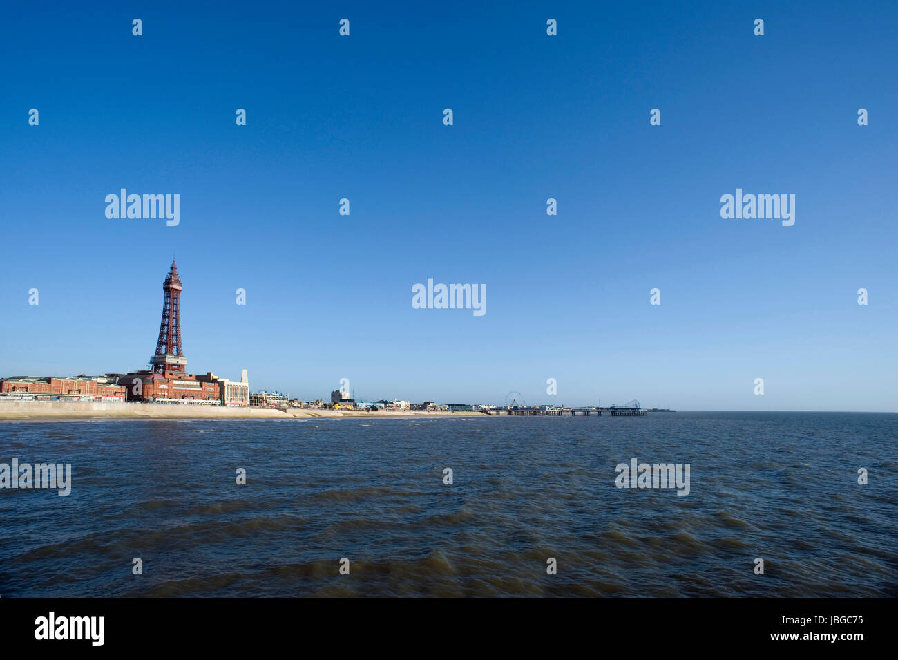 View of Blackpool seafront from the ocean showing the sandy beach ...