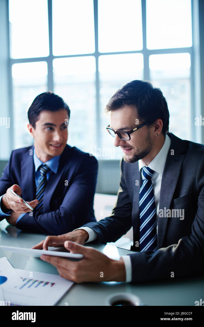 Image of two young businessmen networking at meeting Stock Photo - Alamy