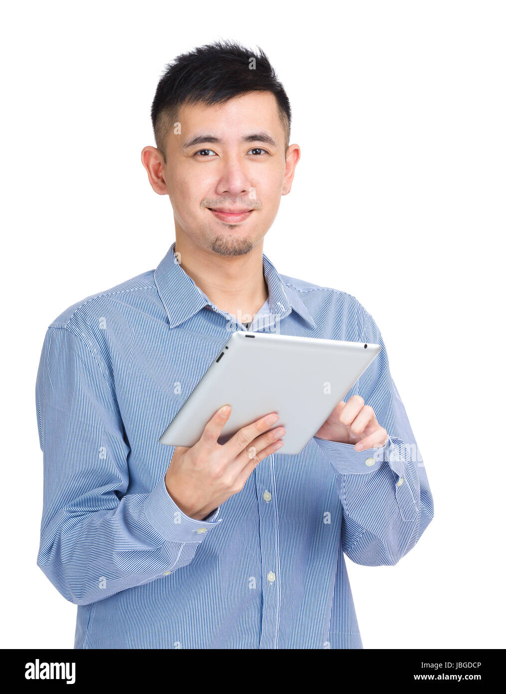 Asian man using tablet Stock Photo - Alamy