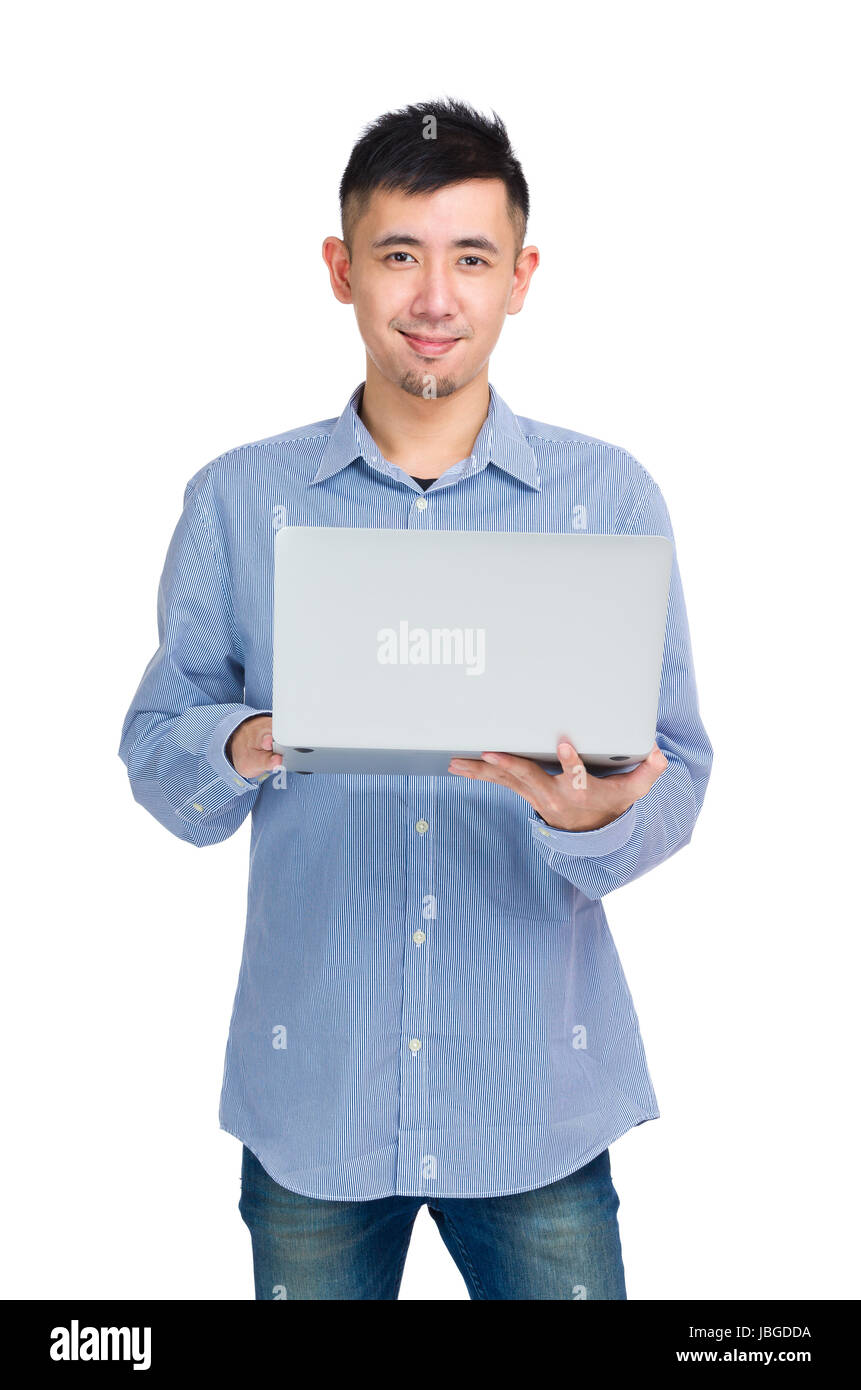 Asian man using computer Stock Photo - Alamy
