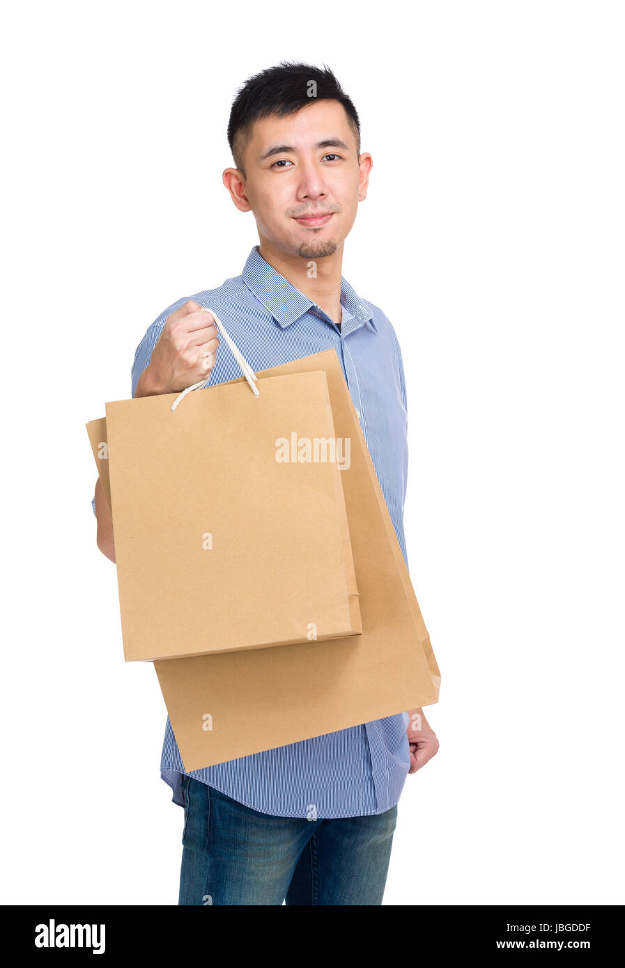 Asian man holding shopping bag Stock Photo - Alamy