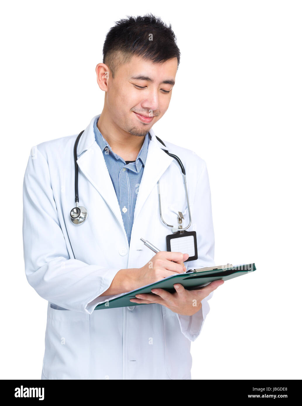 Medical doctor looking at clipboard Stock Photo - Alamy