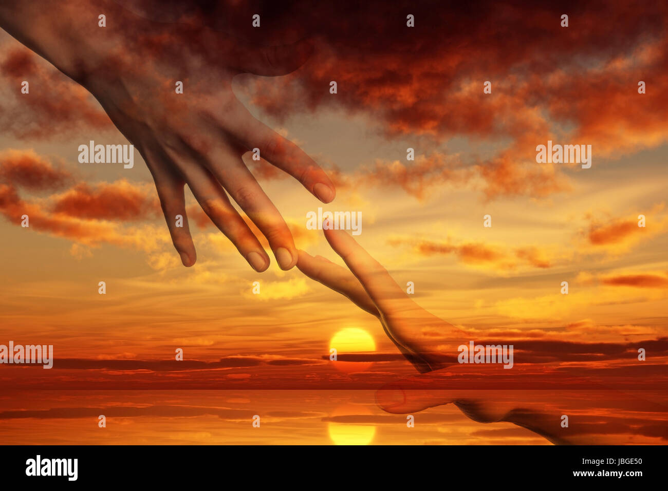 Hope of peace. Hands on the ocean sunrise background Stock Photo - Alamy