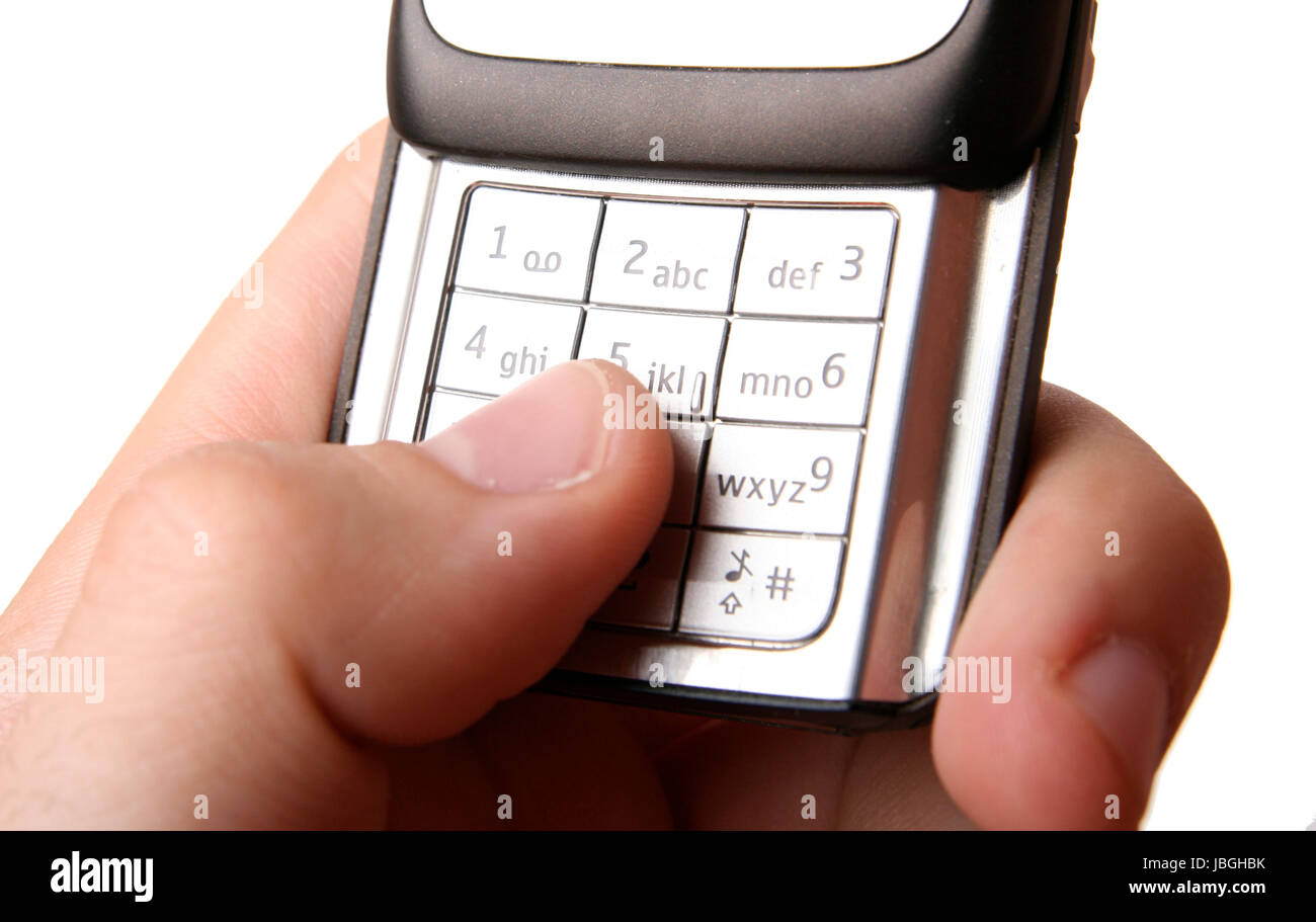 Cell Phone in a man hand. Isolated on white background Stock Photo - Alamy