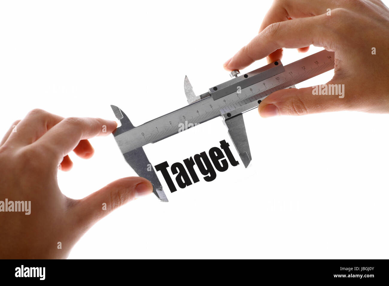 Close up shot of a caliper measuring the word "Target Stock Photo - Alamy