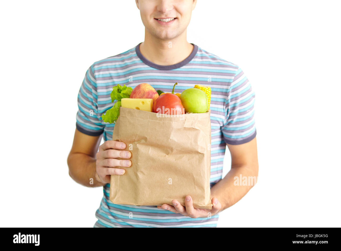Man market veg packet hi-res stock photography and images - Alamy