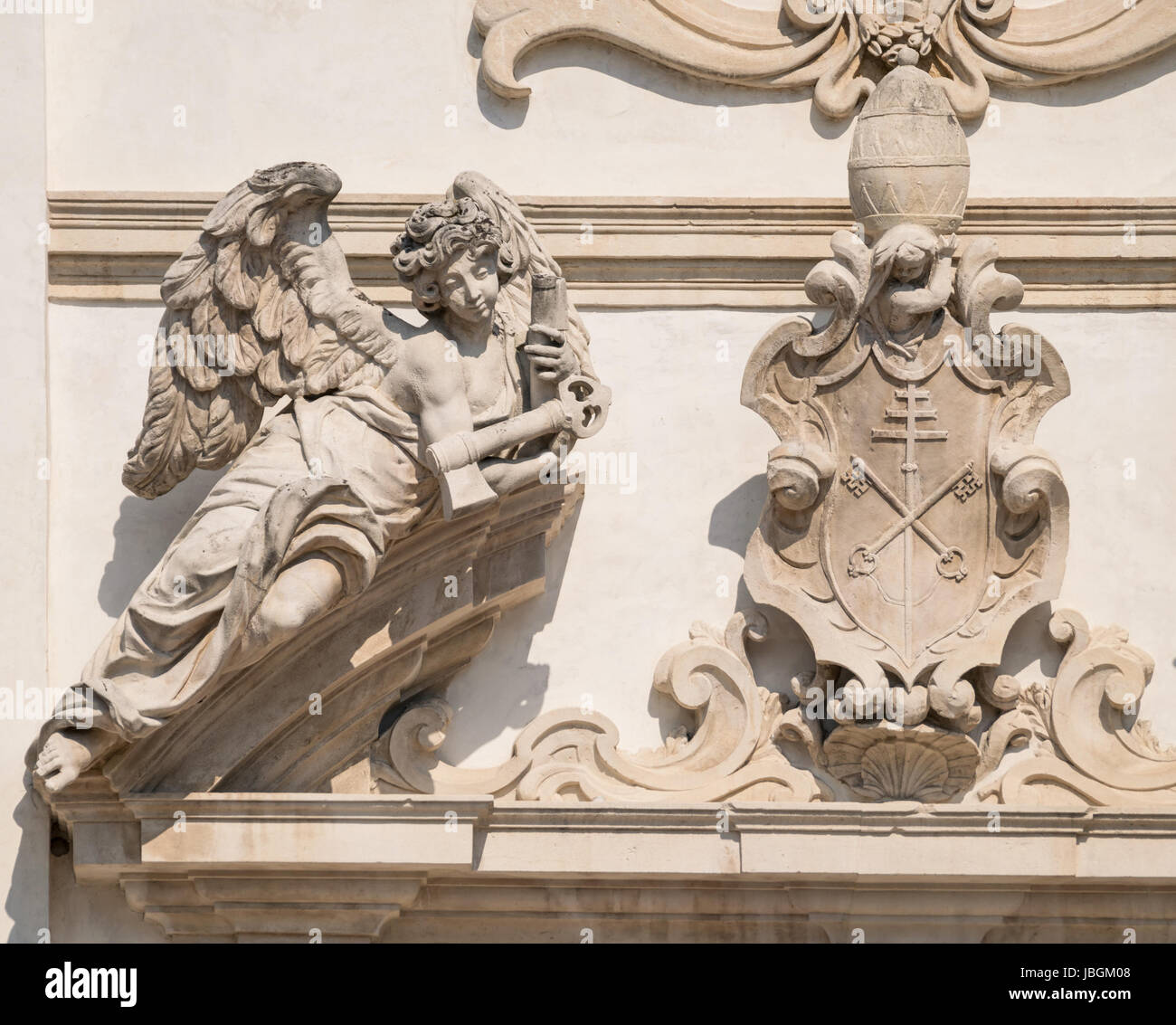 Detail of a stone angel on the facade of a medieval church Stock Photo ...