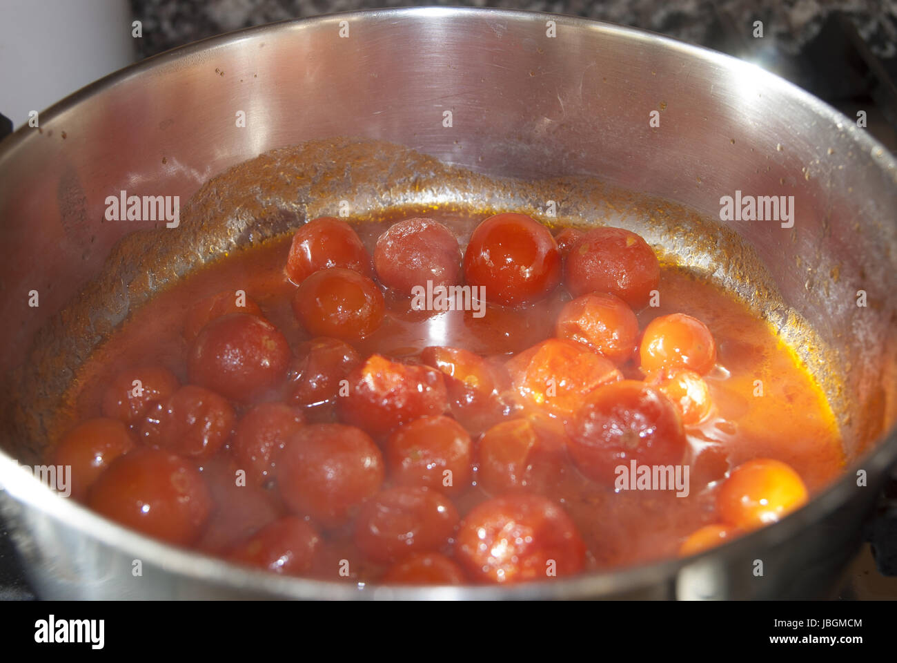 a traditional Italian recipe: sauce of little tomatoes called pachino ...