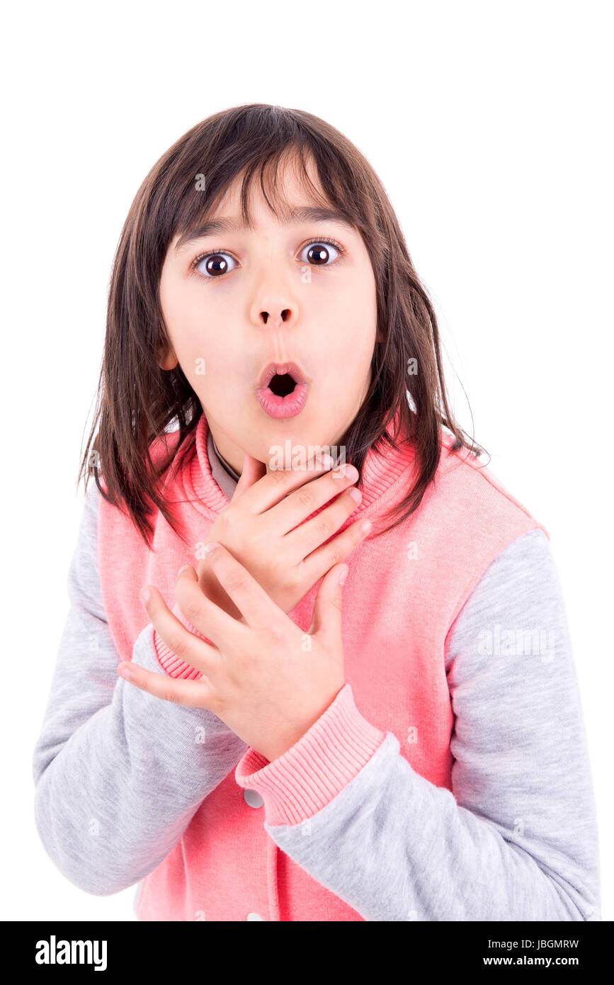 Funny young girl making faces isolated in white Stock Photo - Alamy