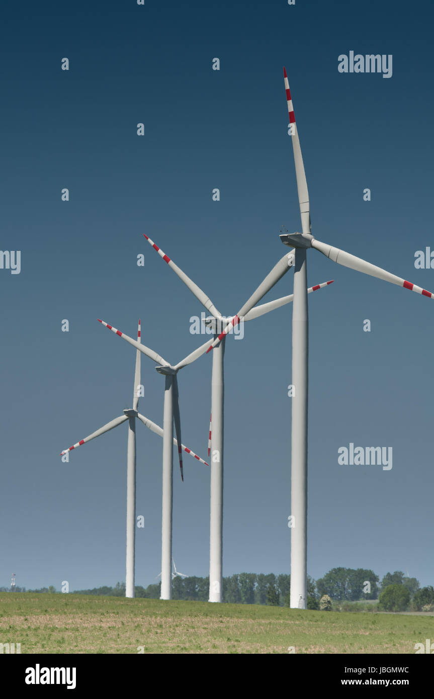 Wind turbine farm on rural terrain Stock Photo - Alamy