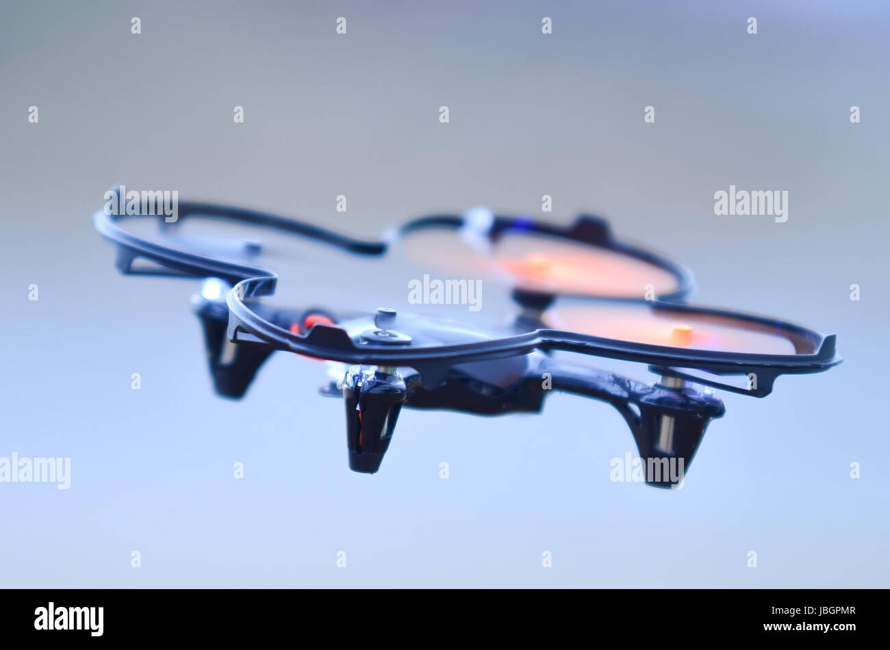 remote controlled quadcopter drone in mid air Stock Photo - Alamy
