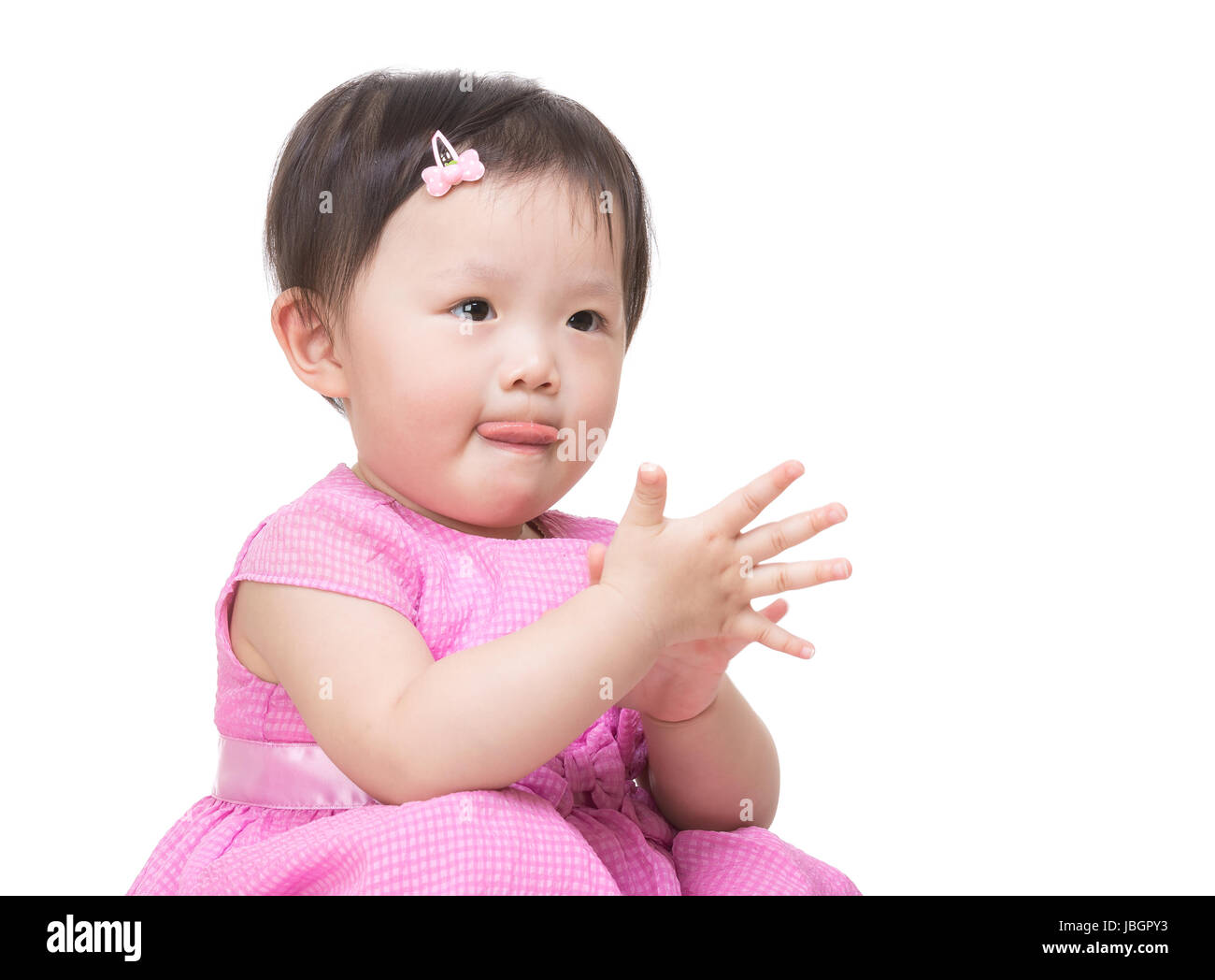 Asia little girl clapping hand Stock Photo - Alamy