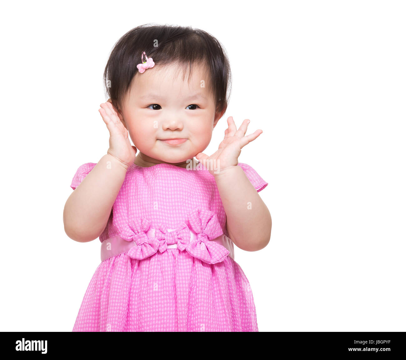 Asia little girl with hand on face Stock Photo - Alamy