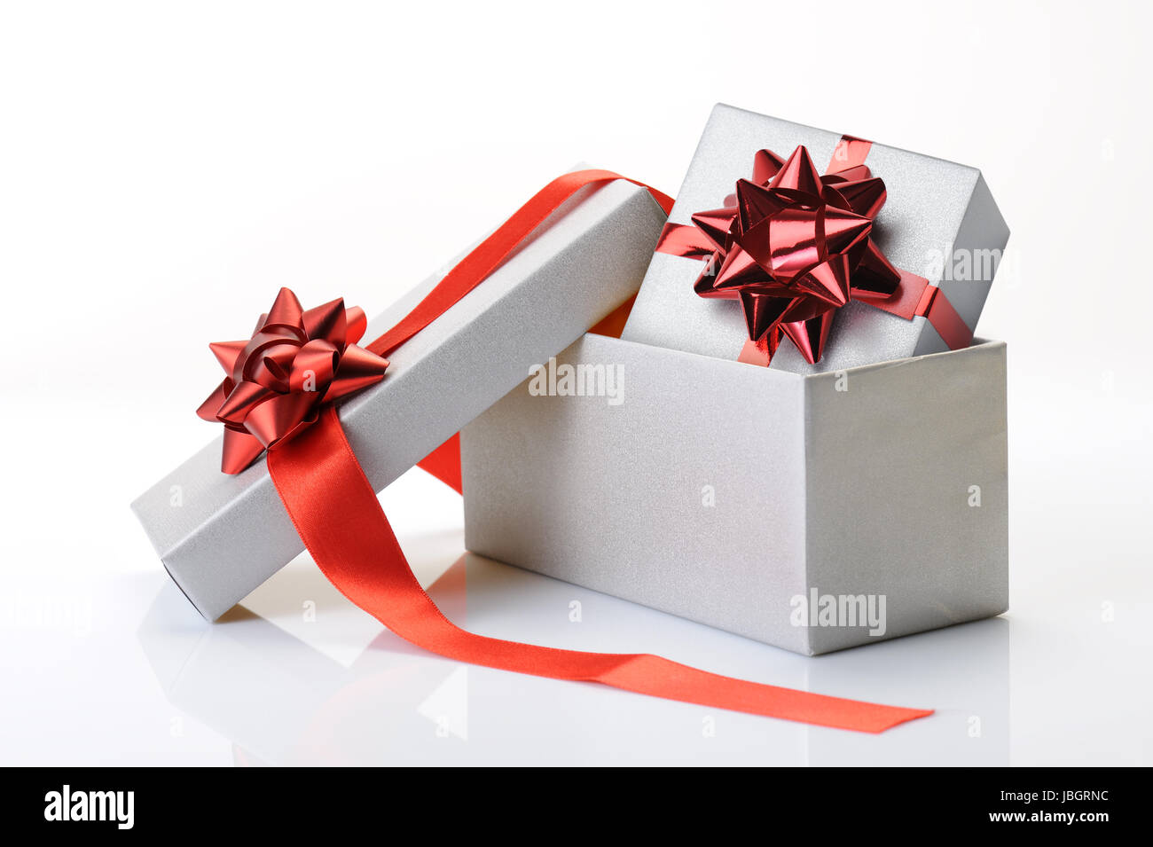open gift box with bow and red ribbon on white background Stock Photo ...