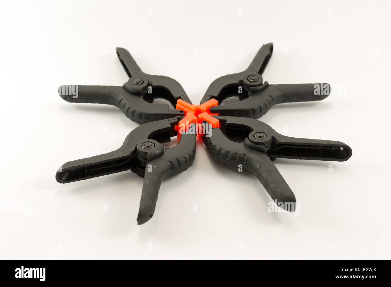 These sturdy spring clamps are made of a hard and strong plastic, and ...