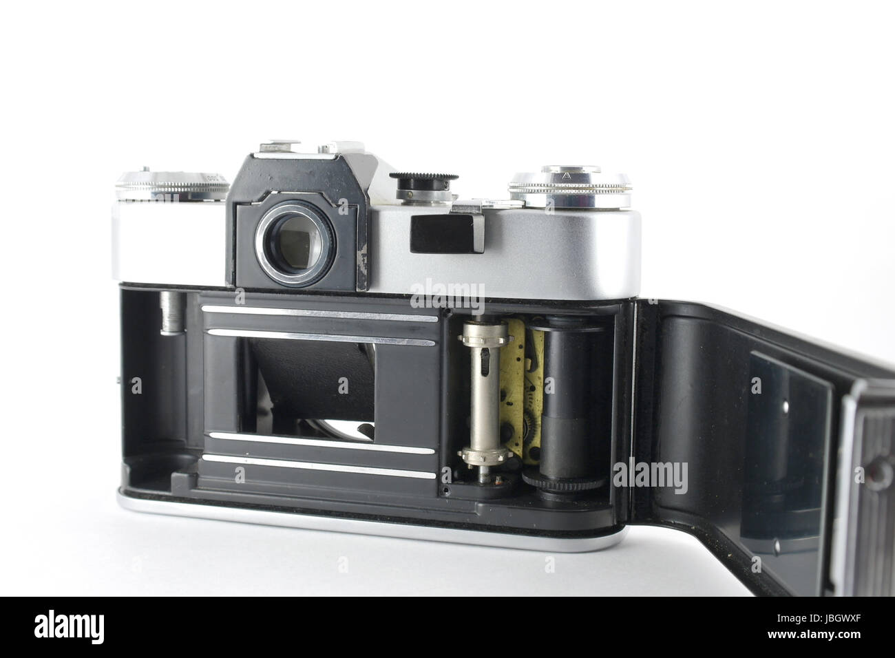 Old film camera with open lid over white Stock Photo - Alamy