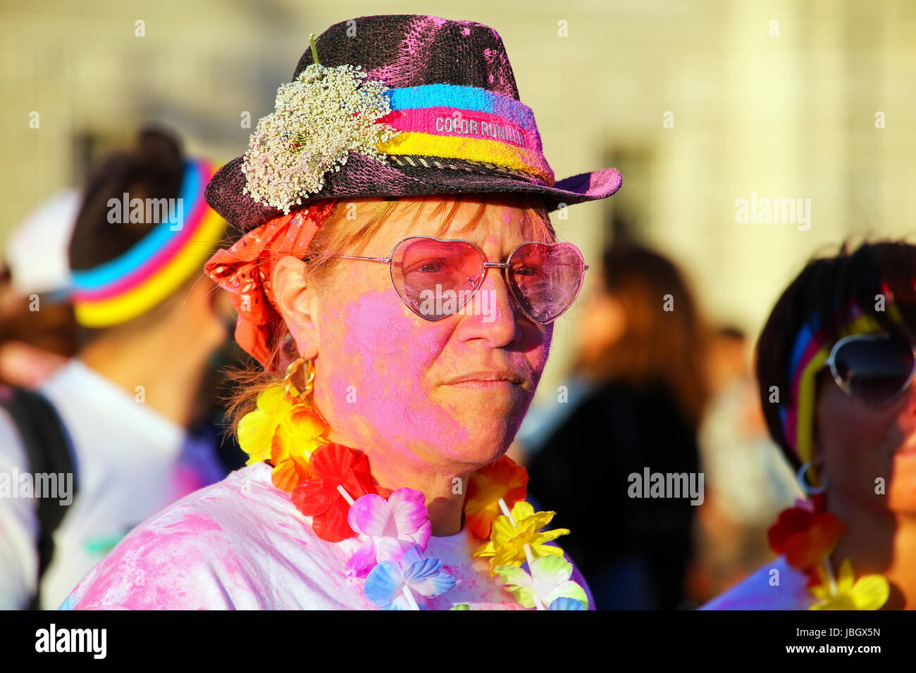 Portrait of a woman taking part in The Color Run in Trieste, Italy ...