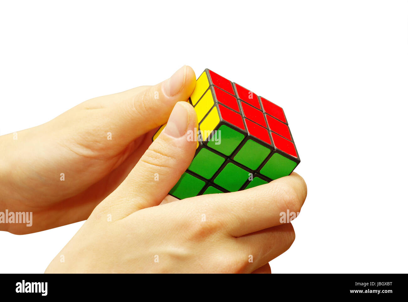 hands trying to resolve the puzzle Stock Photo - Alamy