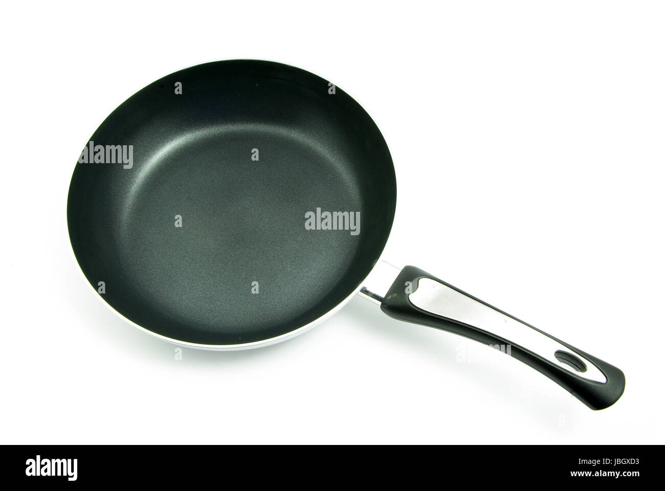 Frying pan isolated over white background Stock Photo - Alamy