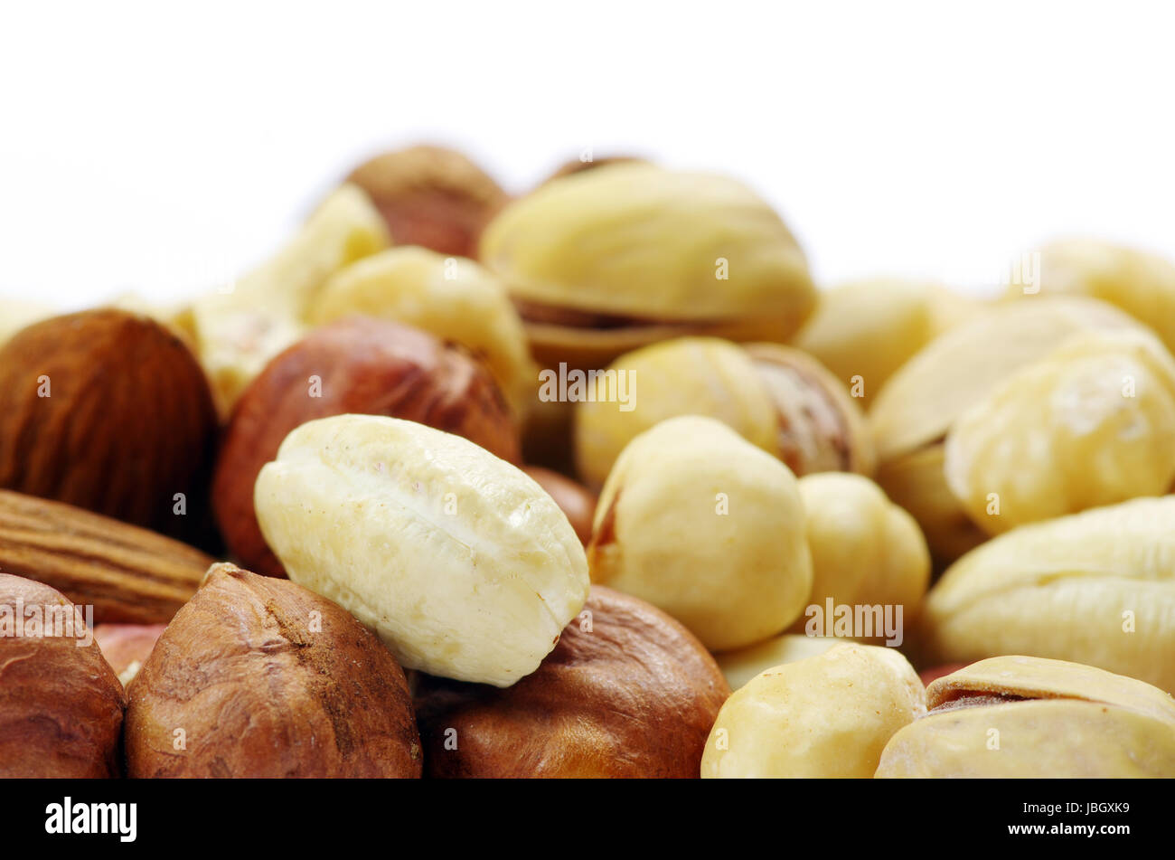 Assorted mixed nuts on white background Stock Photo - Alamy