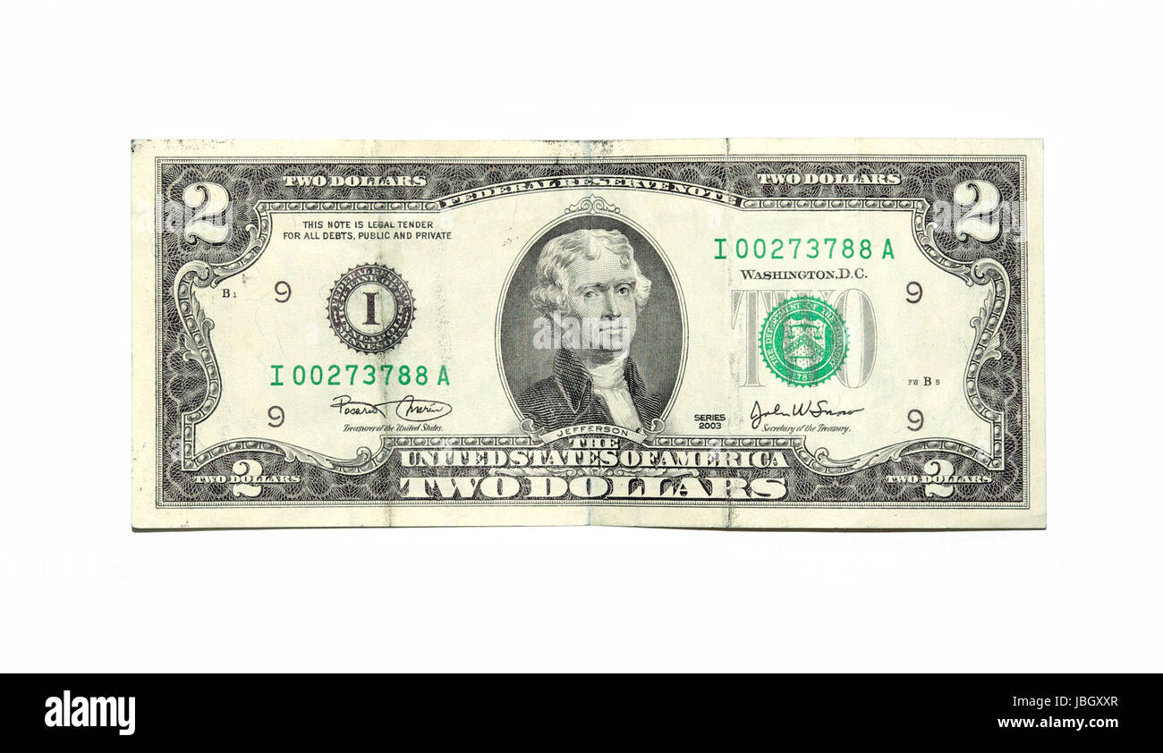 Two dollars on a white background Stock Photo - Alamy