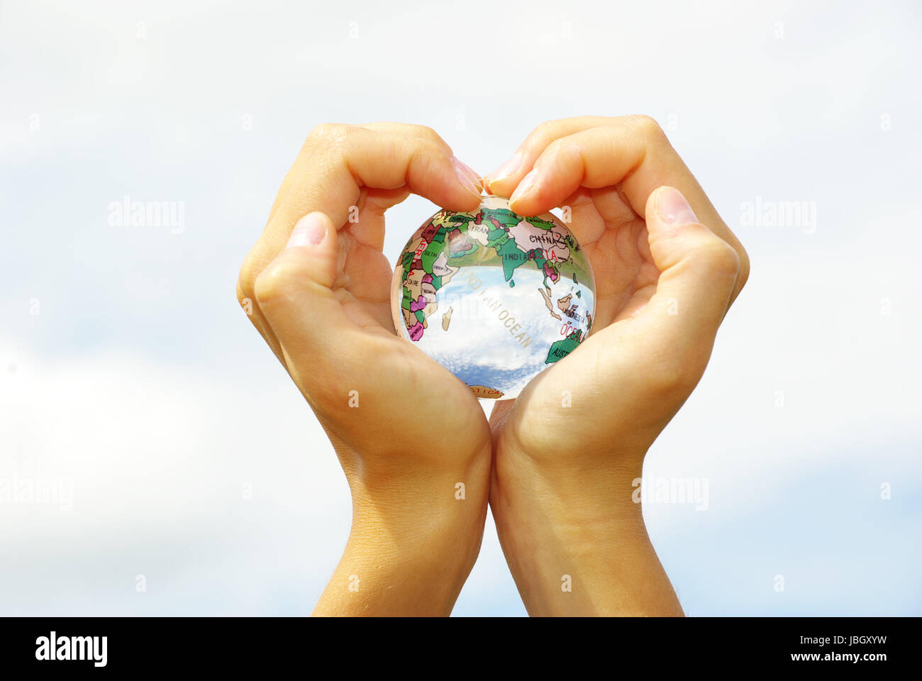 globe on the human hand Stock Photo - Alamy
