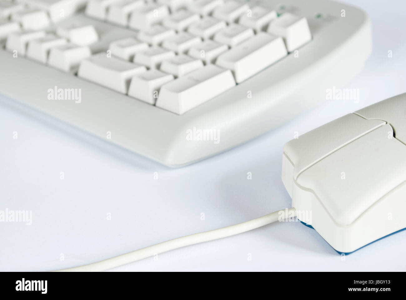 computer mouse and keyboard on white Stock Photo - Alamy