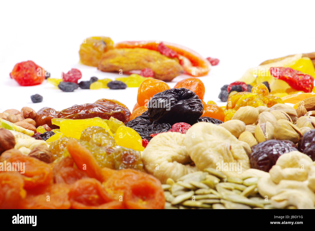 assorted dried fruits isolated on white Stock Photo - Alamy