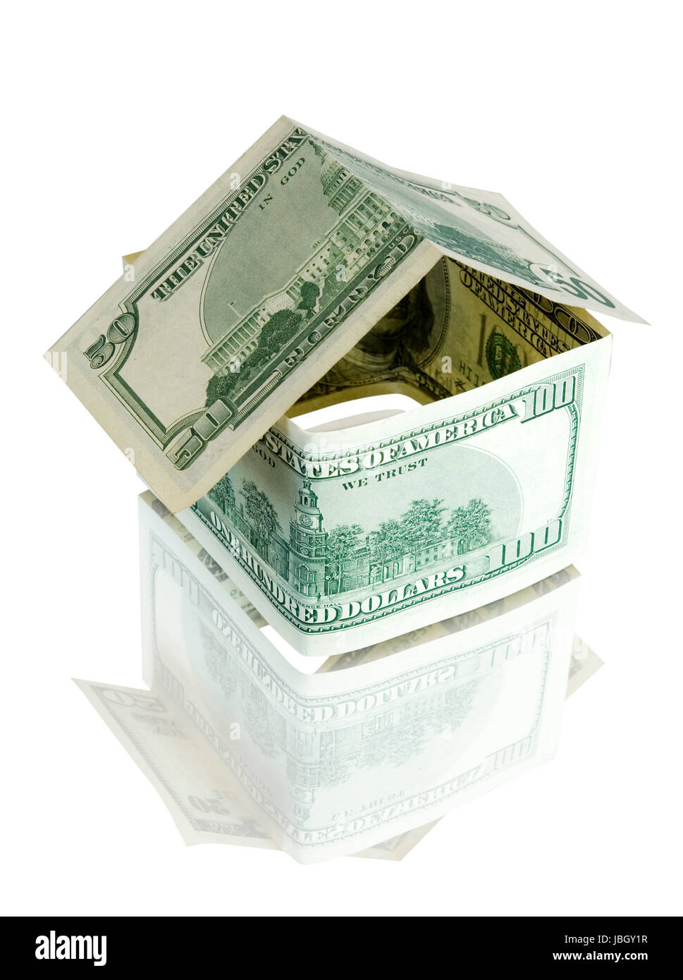 Money house on white background Stock Photo - Alamy