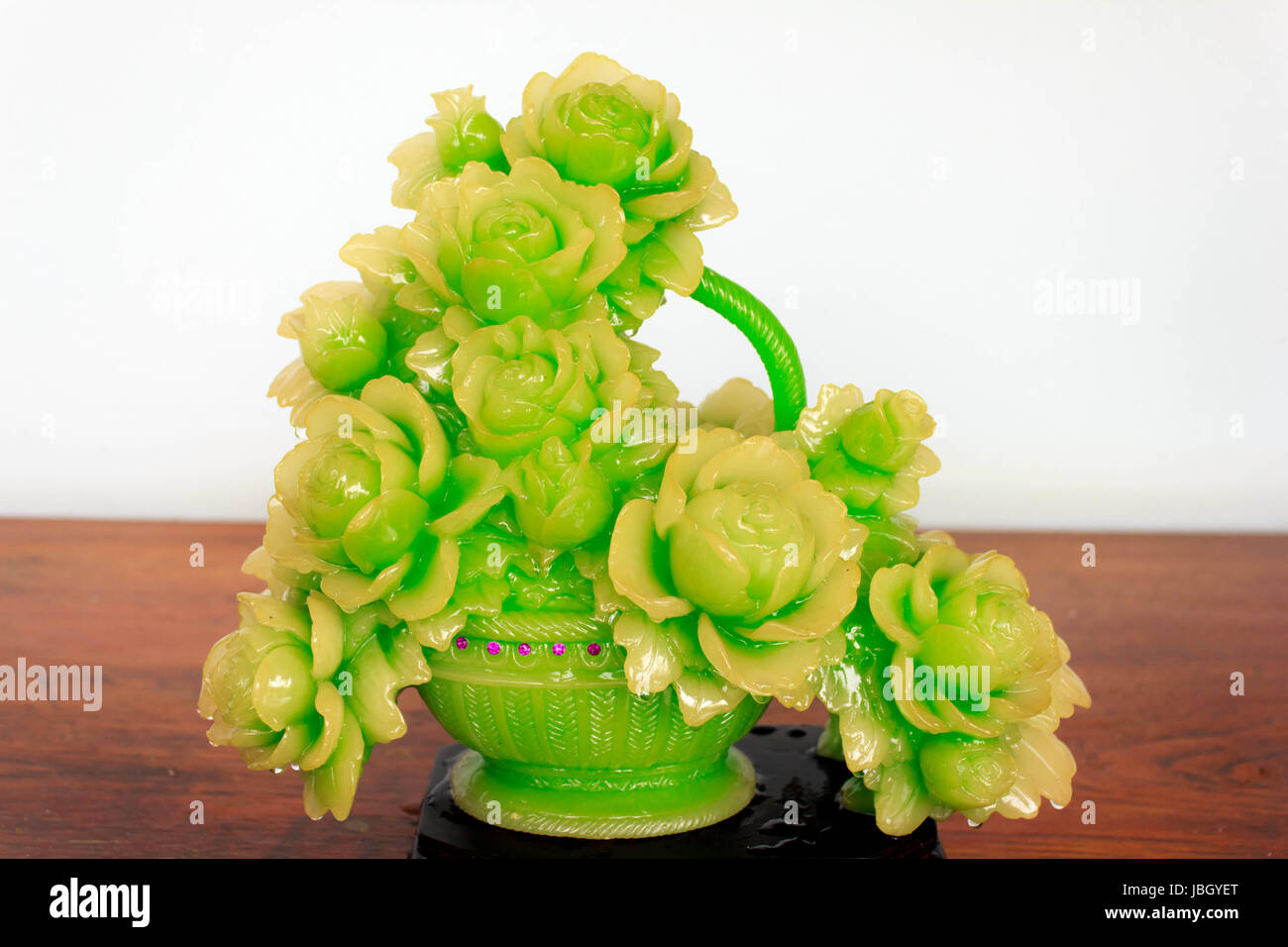 flower made of Jade on the wooden table Stock Photo - Alamy