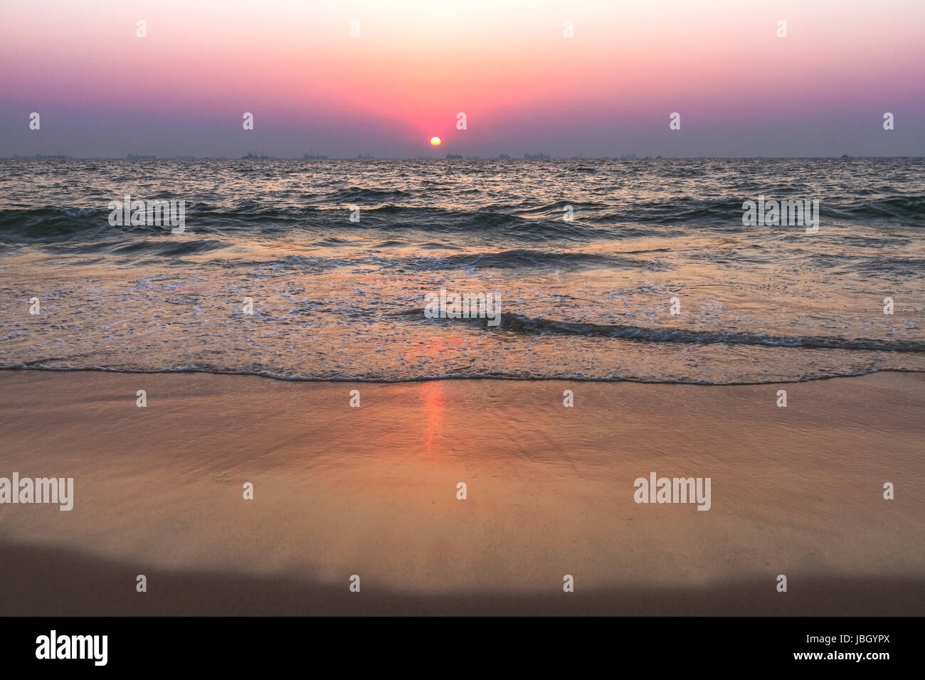 Scenic view from sand beach in Goa to beautiful sunset above the ...