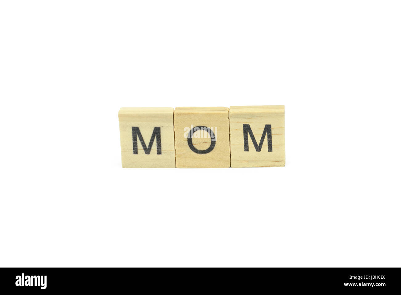 Text wooden blocks spelling the word mom on white background Stock ...