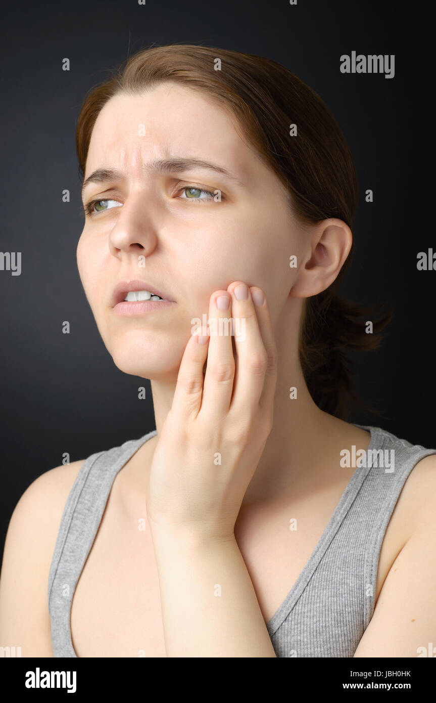 Sick young woman having toothache hi-res stock photography and images ...