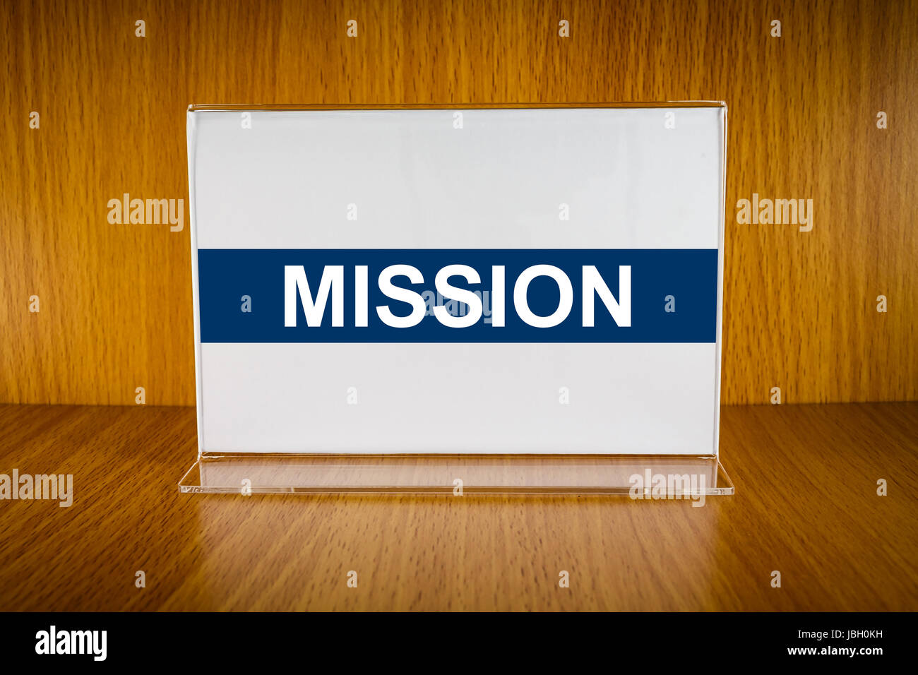 Mission word on clear Acrylic card holder Stock Photo - Alamy