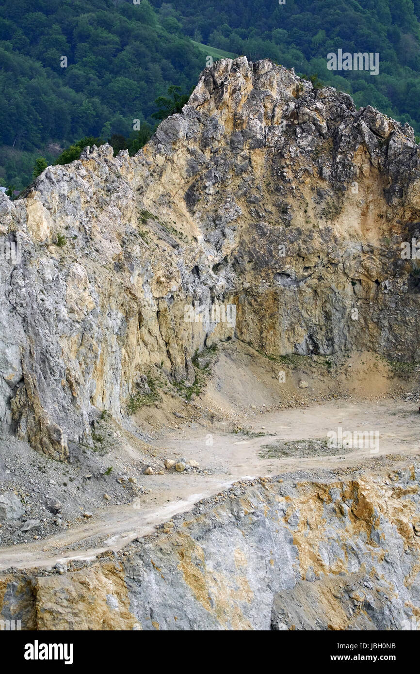 Landscape with a large stone quarry in full development Stock Photo - Alamy